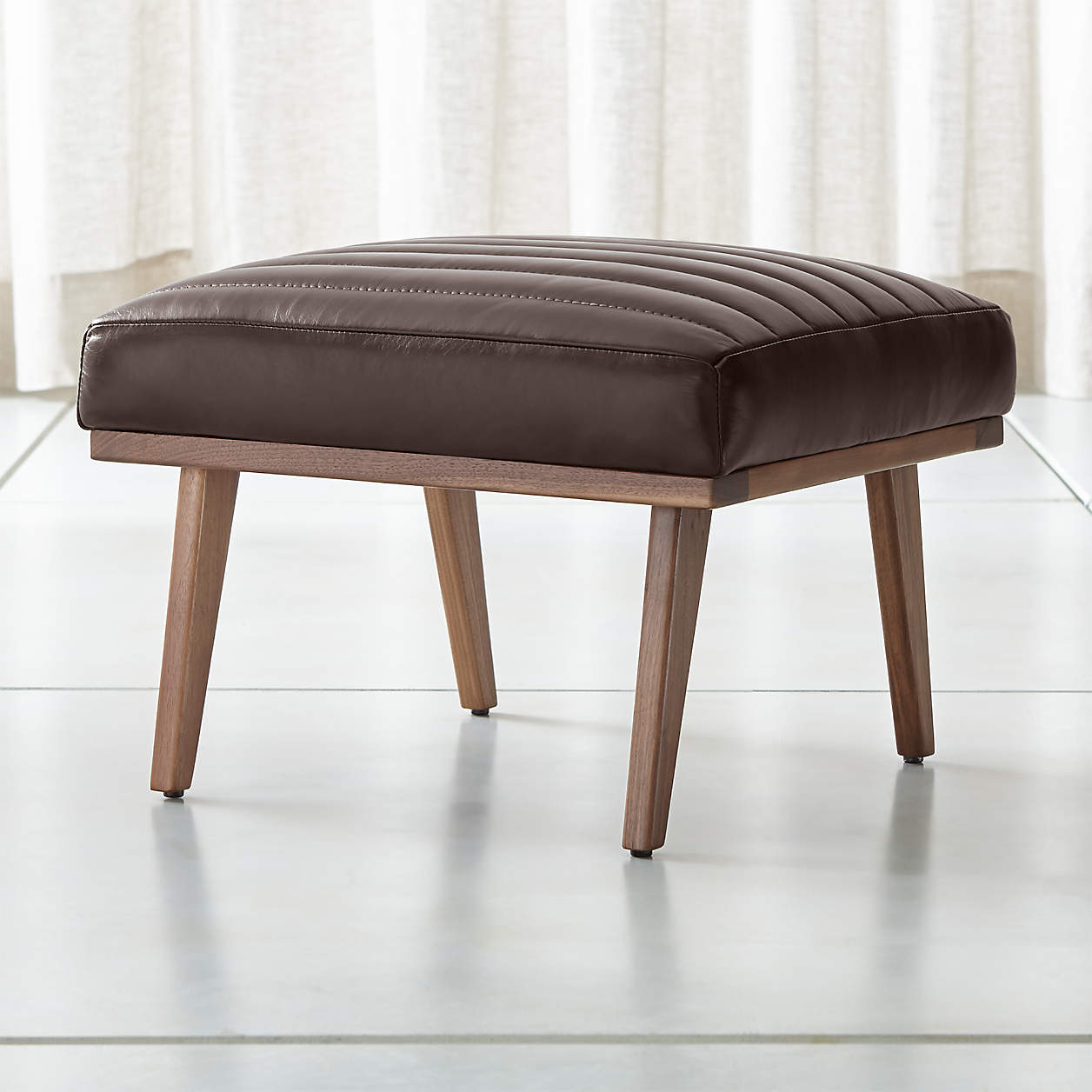 Cavett Channel Leather Walnut Wood Frame Ottoman + Reviews | Crate & Barrel