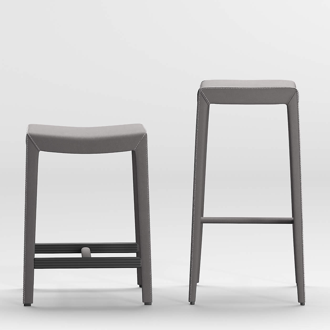 Folio Dark Grey Top-Grain Leather Backless Bar Stools | Crate & Barrel