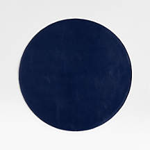 Maxwell Navy Blue Easy-Clean Vinyl Round Placemat | Crate & Barrel