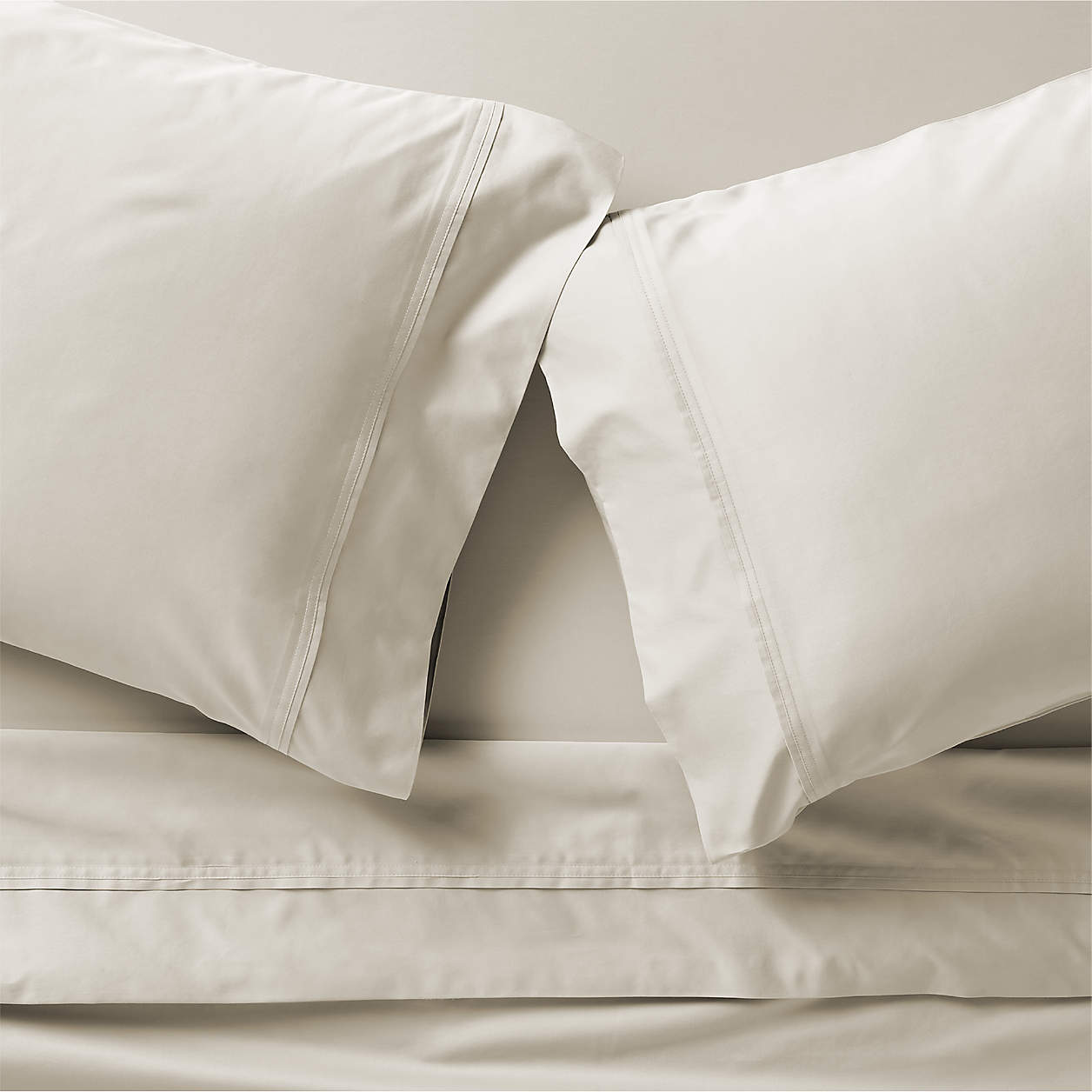 Organic 400 Thread Count Sateen Ivory Pillow Sheet Sets | Crate & Barrel