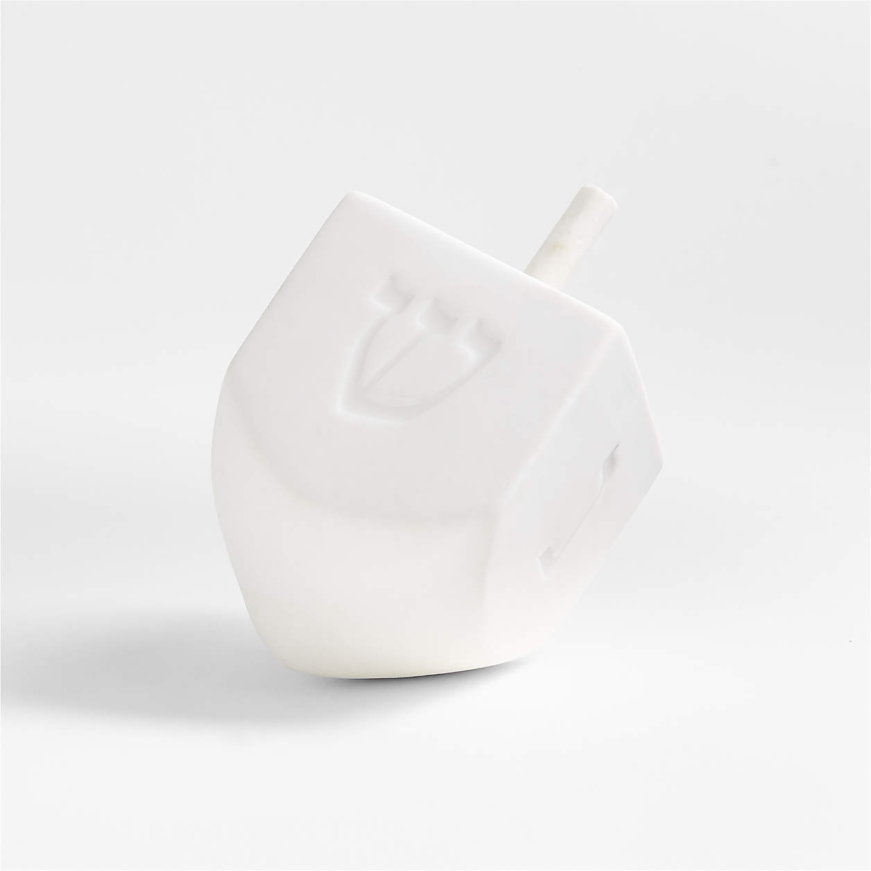White Porcelain Dreidel Sculptures | Crate & Barrel