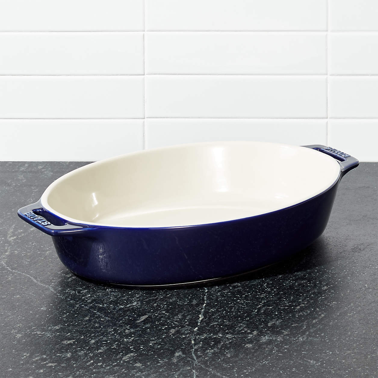 Staub Dark Blue Oval Baker + Reviews | Crate & Barrel