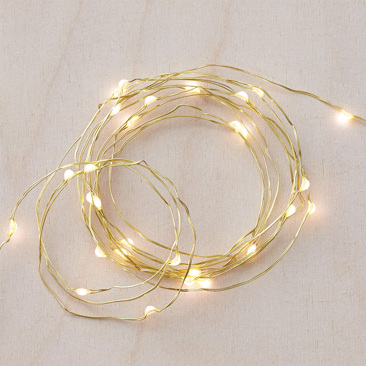 Twinkle Gold 10' Outdoor Patio String Lights + Reviews | Crate & Barrel