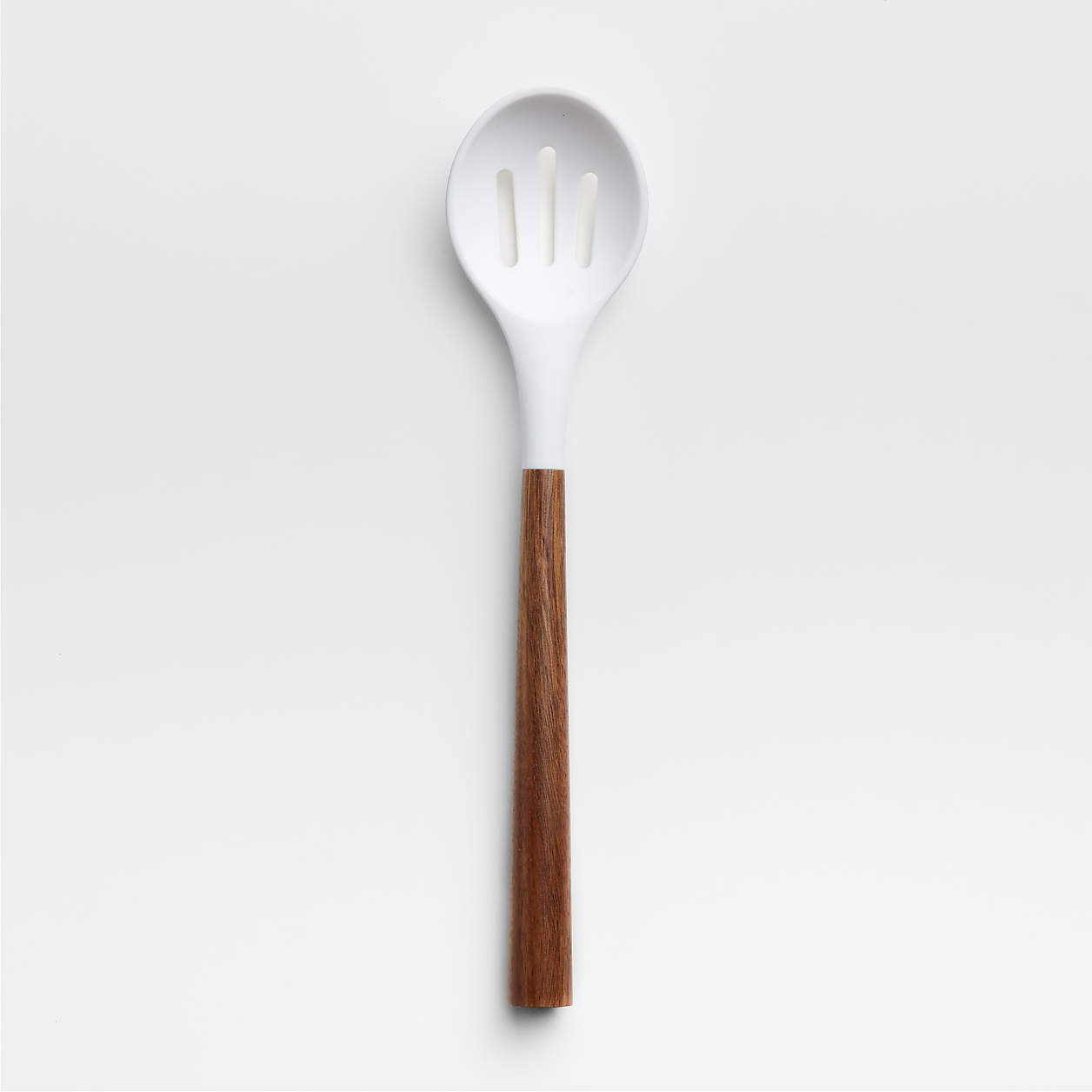 White Silicone Slotted Spoon with Acacia Wood Handle | Crate & Barrel